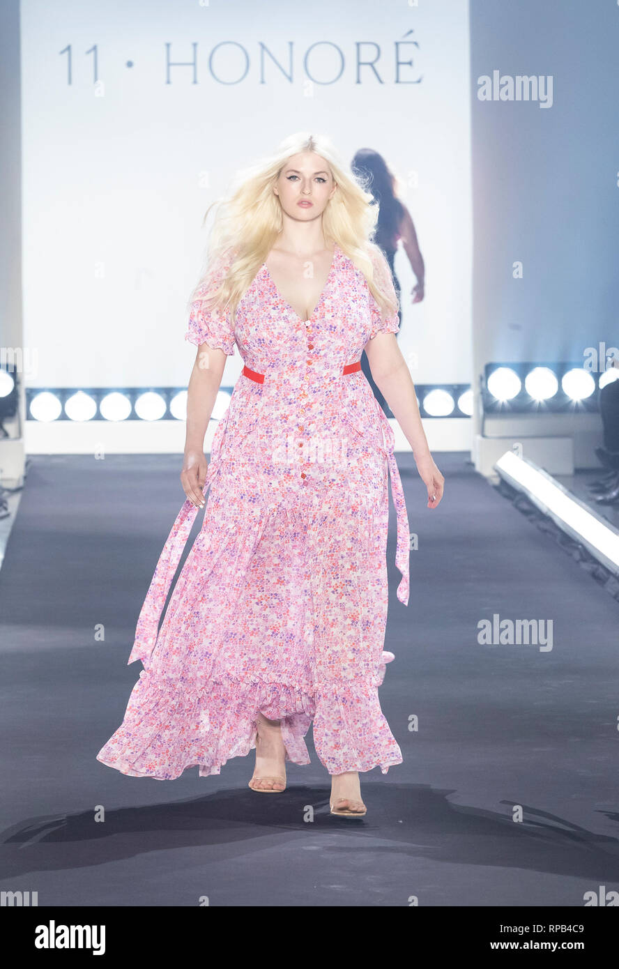 Model wearing dress by Ryan Lo walks runway for 11 Honore fashion show ...
