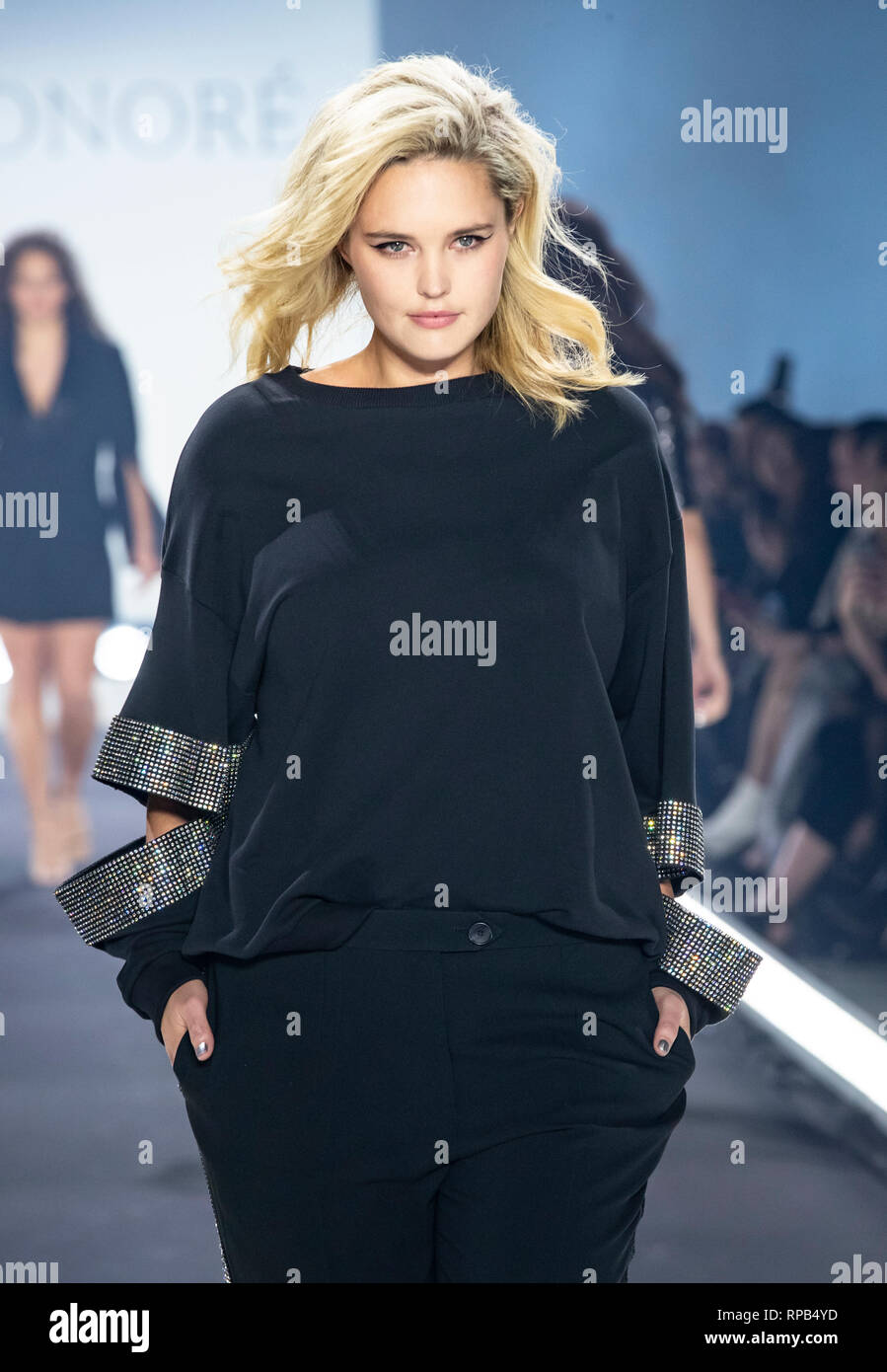 Model wearing dress by Christopher Kane walks runway for 11 Honore ...