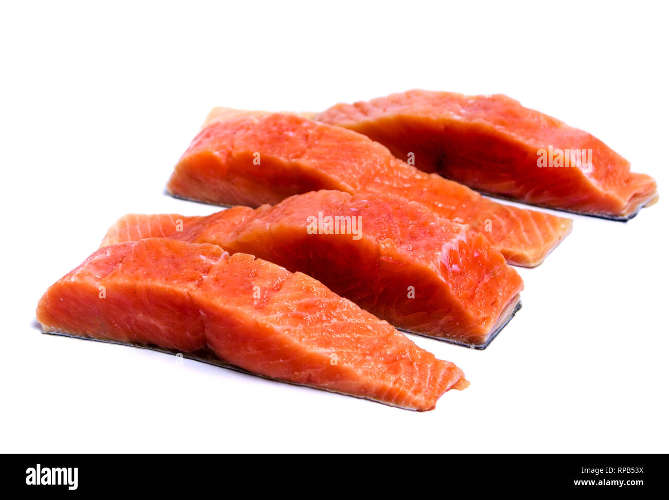 Salmon fish meat isolated on white background Stock Photo - Alamy