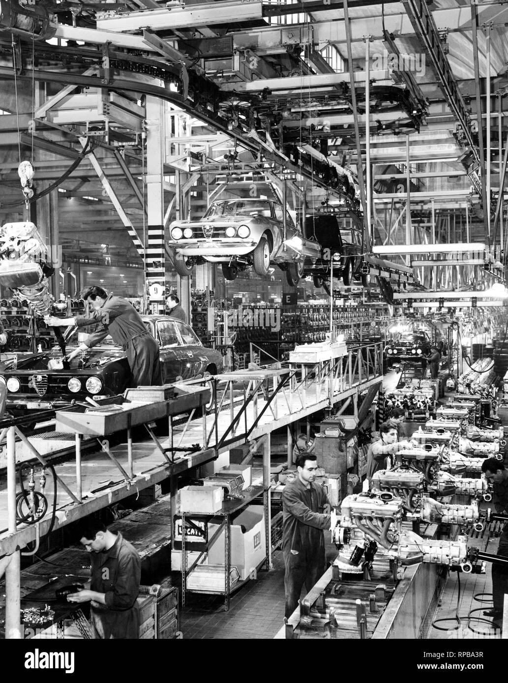 assembly of alfa romeo engines, arese, italy 1968 Stock Photo - Alamy