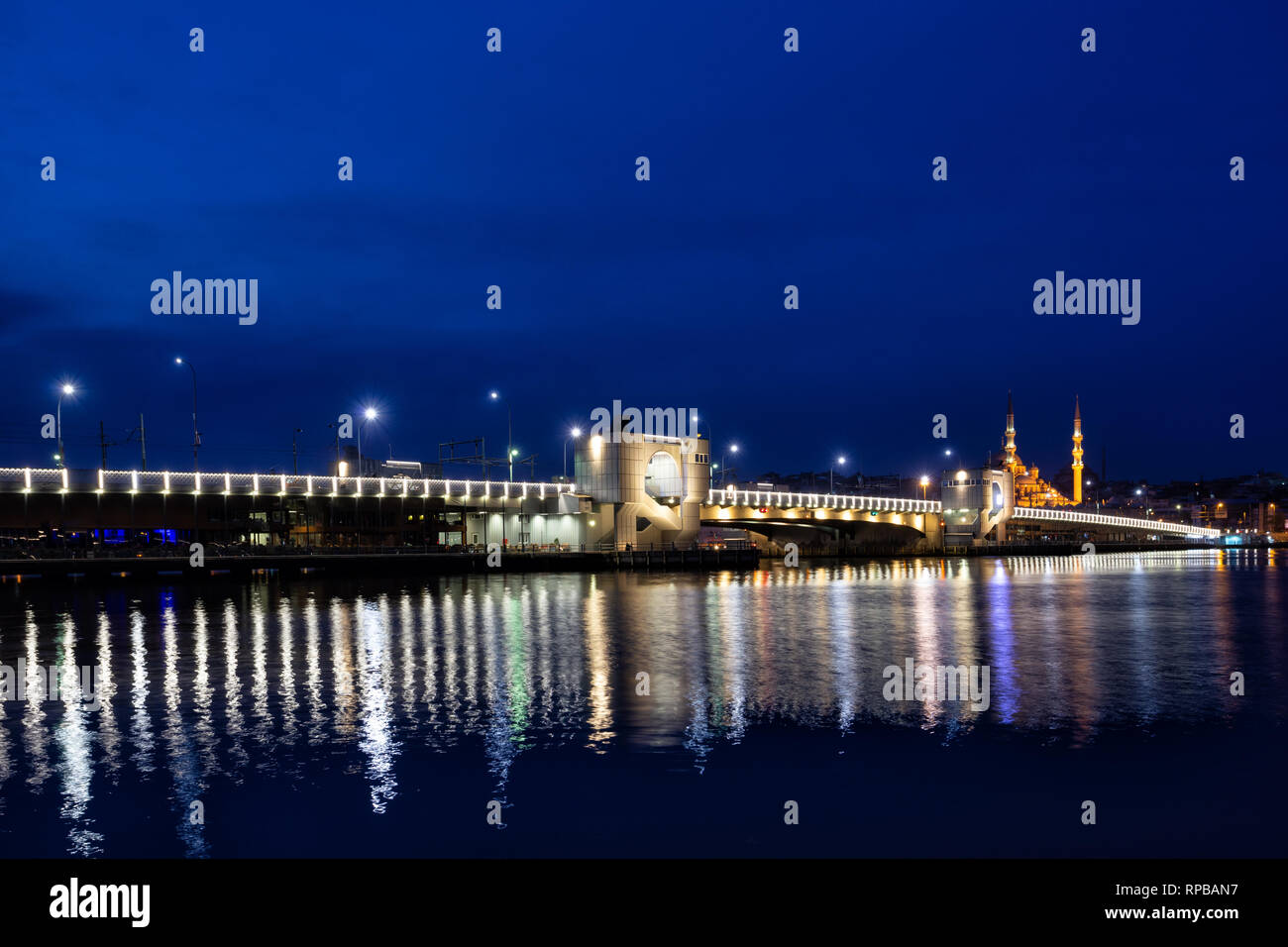 Galata Bridge lit by lights at night Stock Photo - Alamy