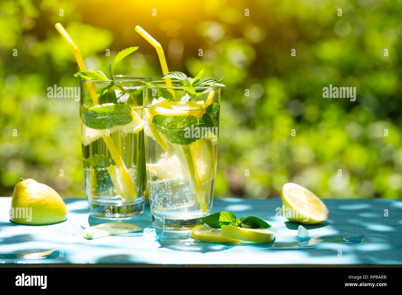 Two glasses of homemade lemonade under bright sun Stock Photo - Alamy
