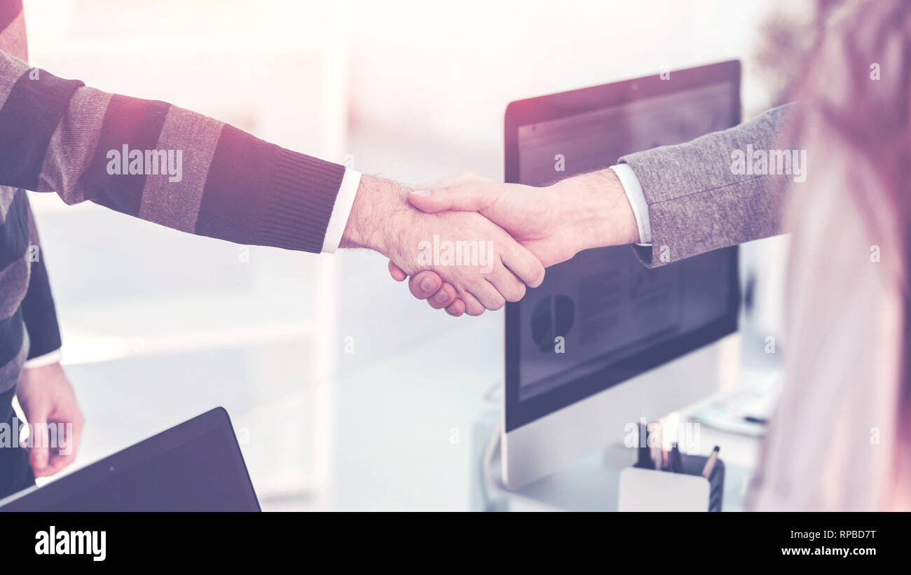 Handshake between manager client hi-res stock photography and images ...