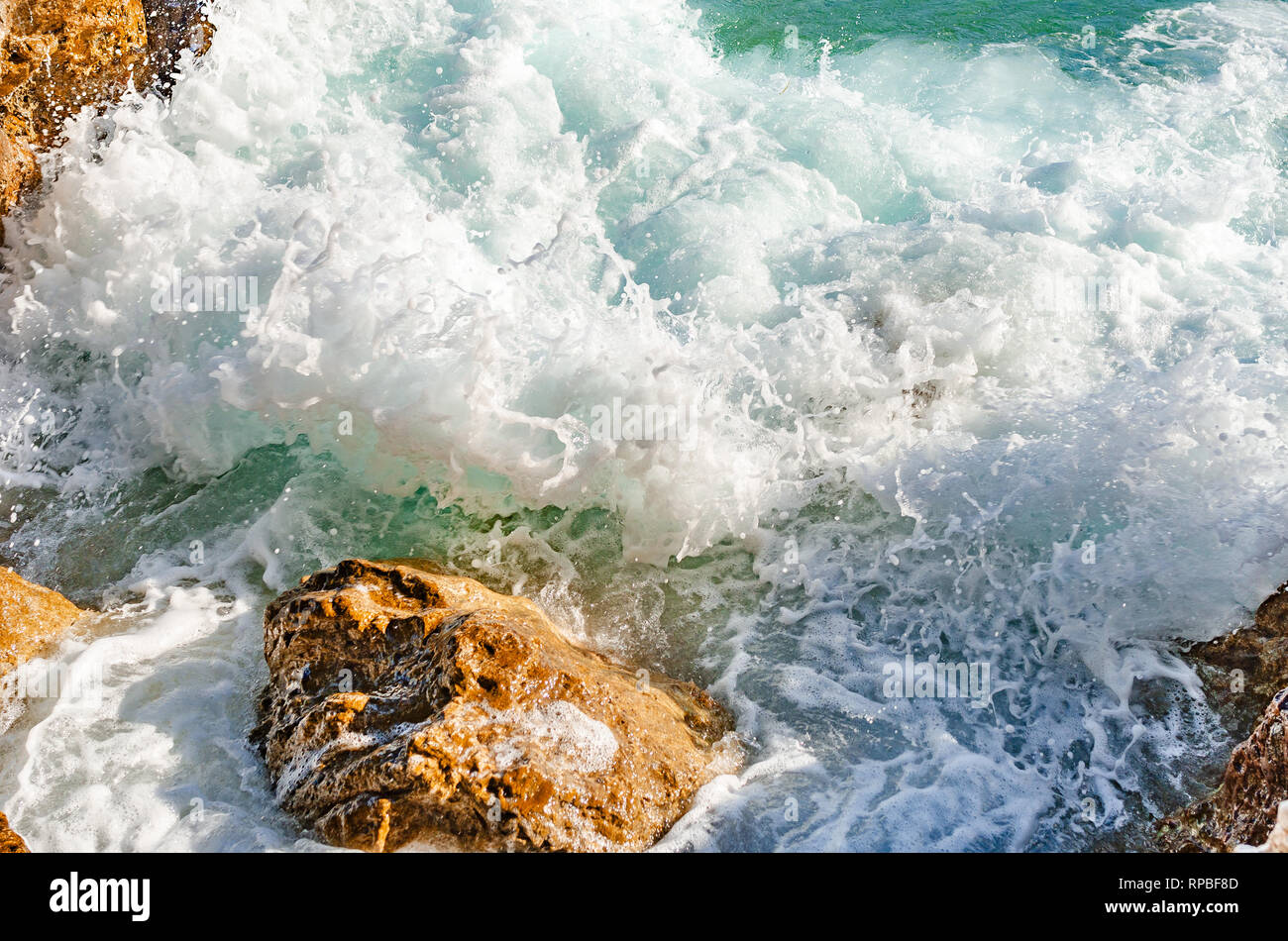 Waves beat on the coastal stones Stock Photo - Alamy