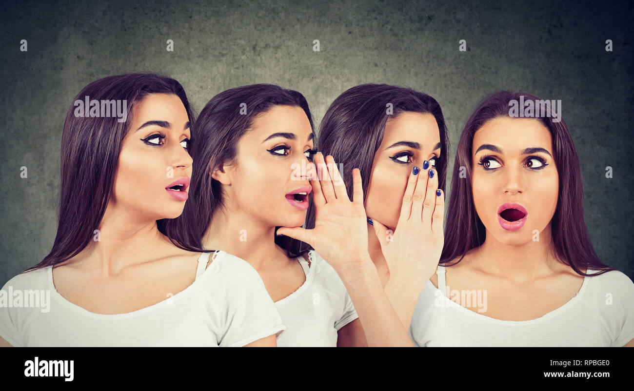 Three young women whispering each other and to a shocked astonished ...