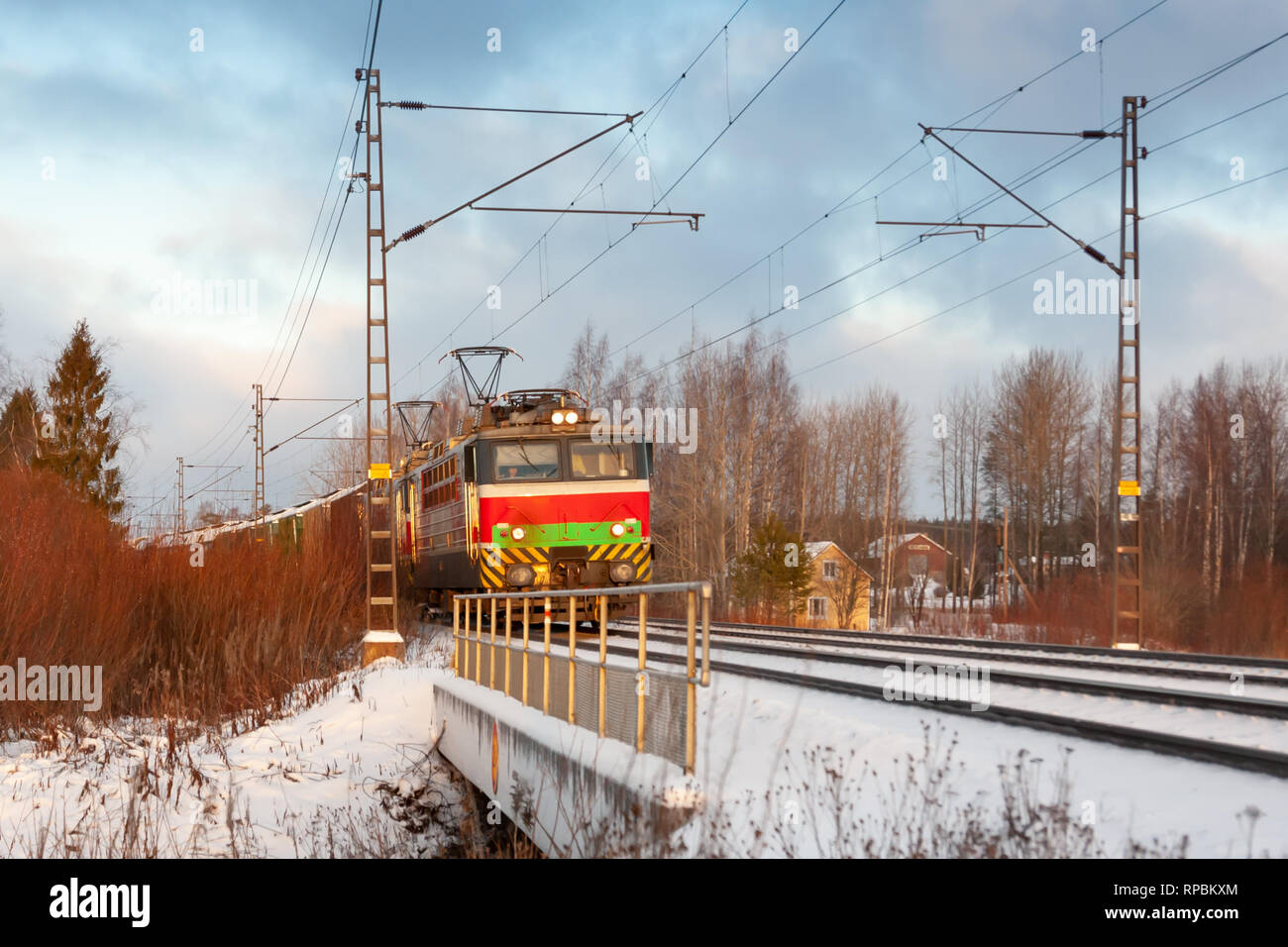 Cargo train at winter morning in Finland Stock Photo - Alamy