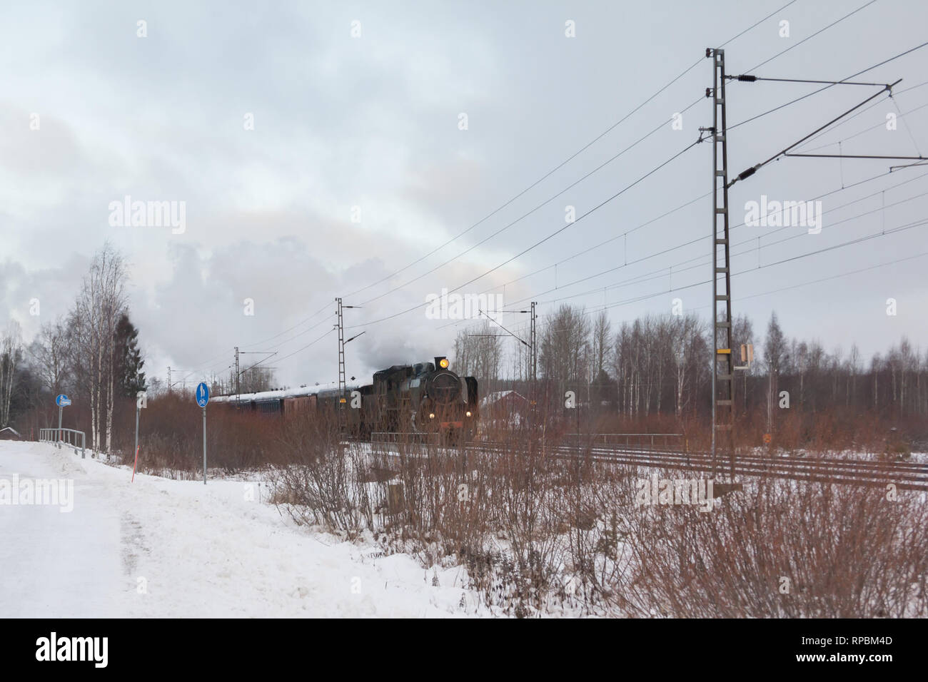 Old retro steam train at winter morning in Finland Stock Photo - Alamy