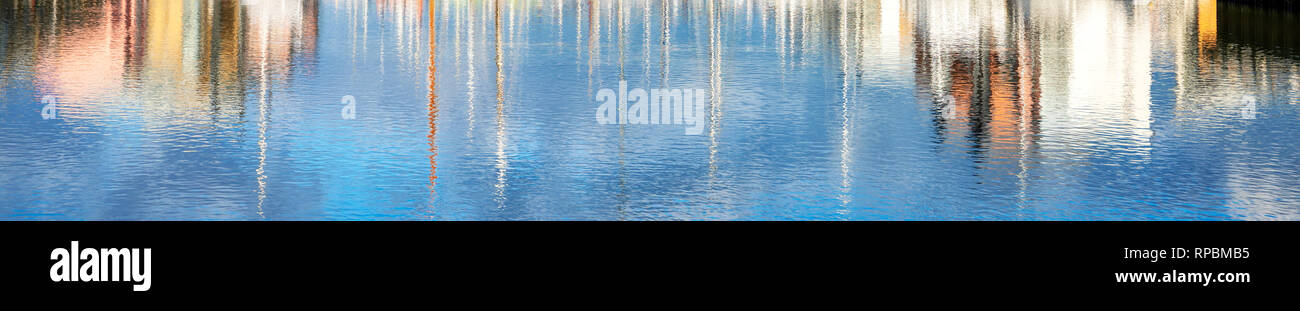 Colourful water reflections - banner image Stock Photo - Alamy