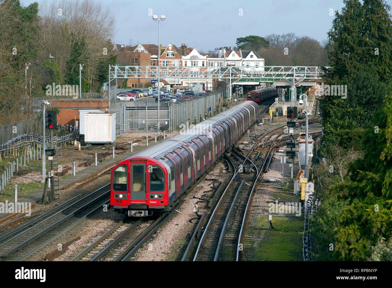 A Central Line train formed of London Underground 1992 stock departs ...