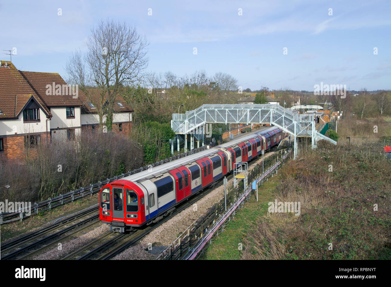 A Central Line train formed of London Underground 1992 stock departs ...