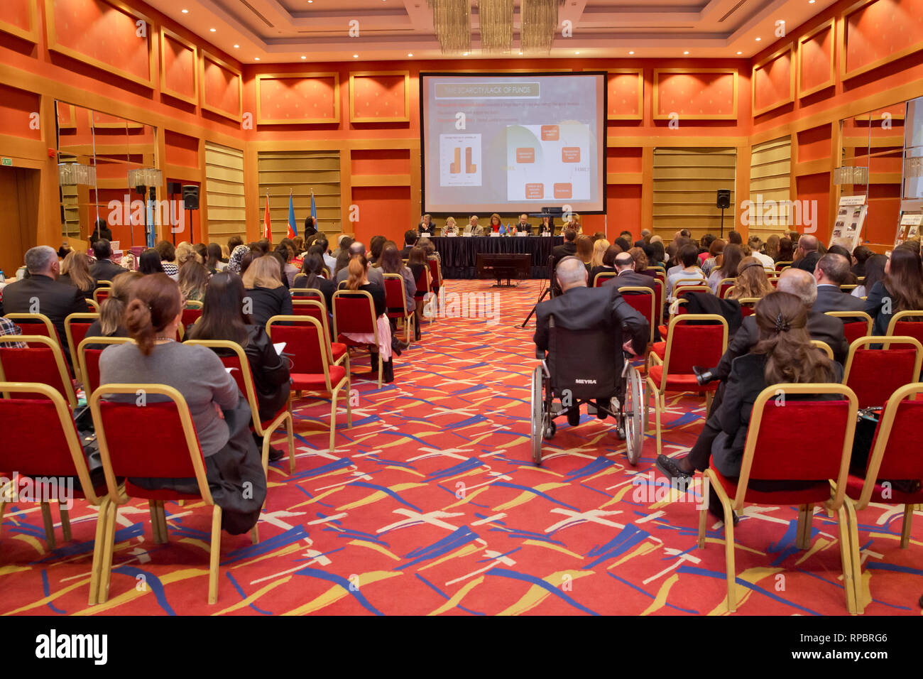 Group of business people attending press conference or presentation ...