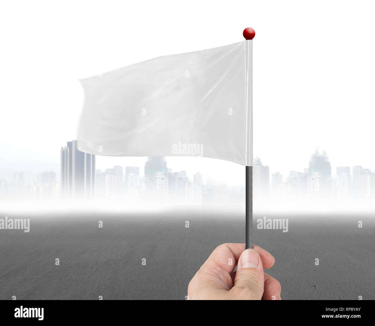 hand holding blank white flag with gary cityscape background Stock ...