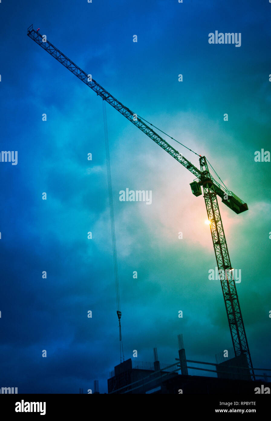 Tower crane lifting hi-res stock photography and images - Alamy