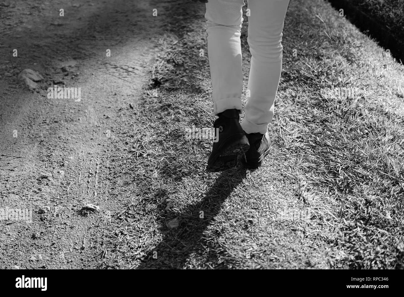 Man wearing denim jeans boots hi-res stock photography and images - Alamy