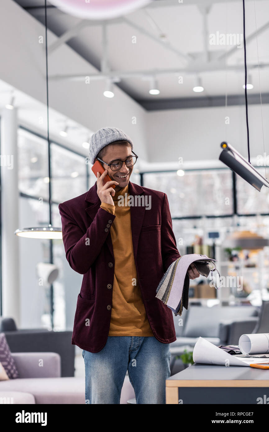 30-years-old handsome procurement manager discussing textile delivery ...