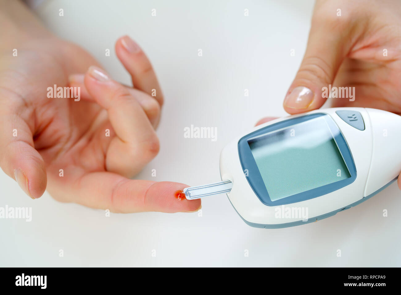 Glucometer lancet device hi-res stock photography and images - Alamy