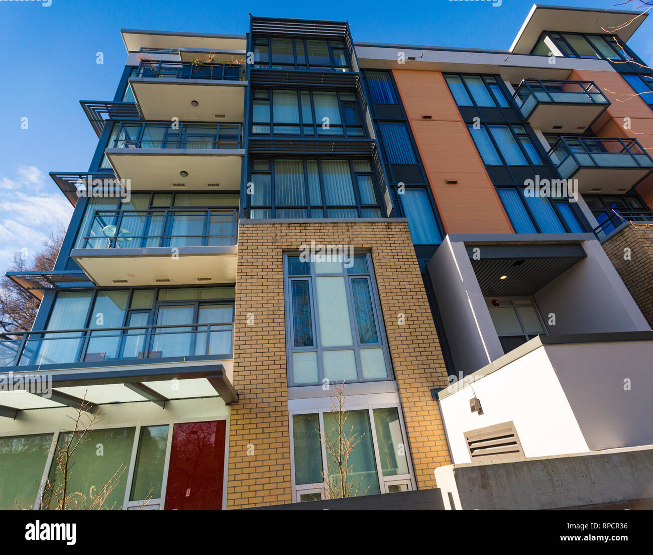 Low rise apartment building on a sunny day in British Columbia, Canada ...
