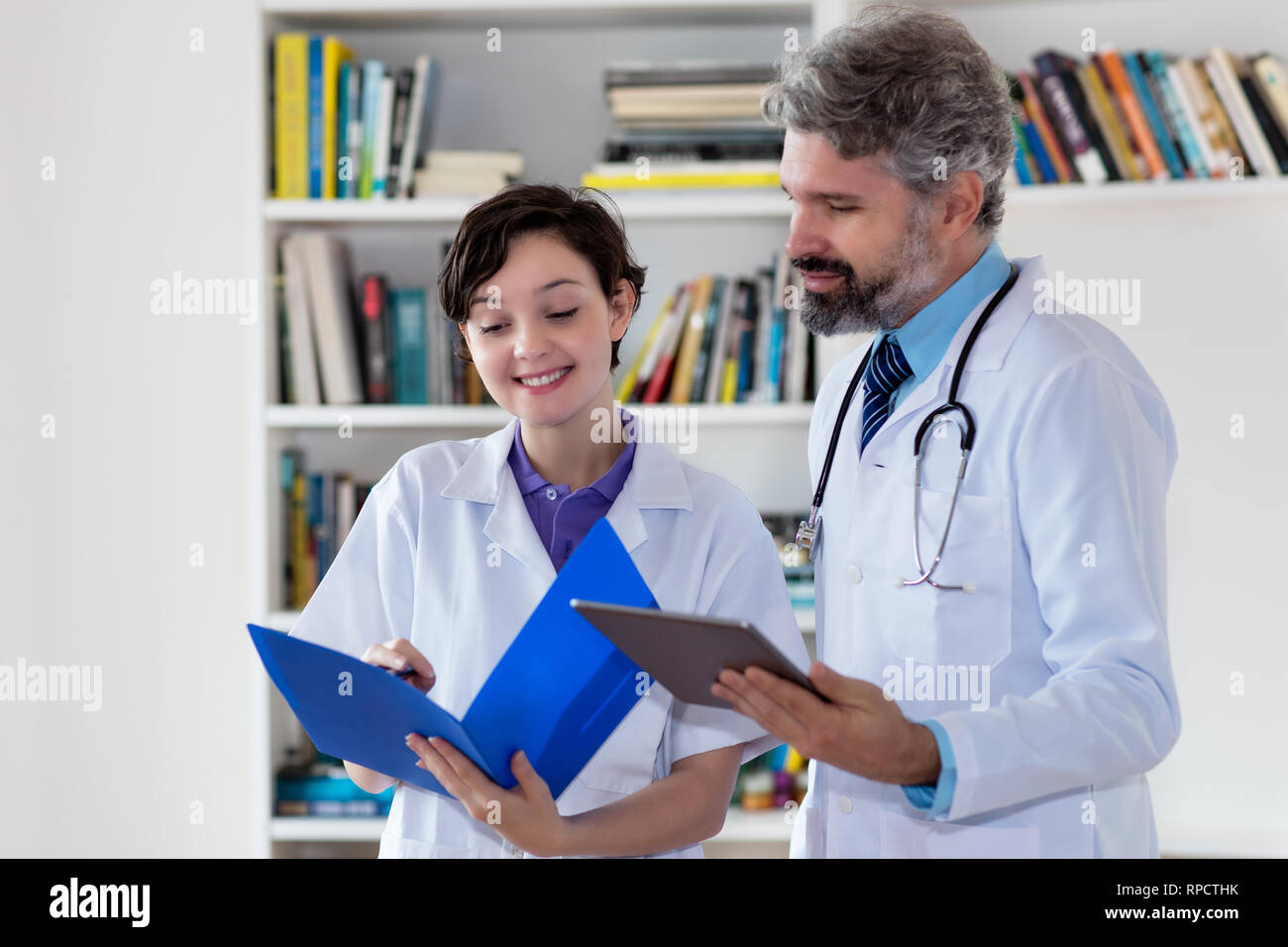 Female doctor patient german hi-res stock photography and images - Alamy