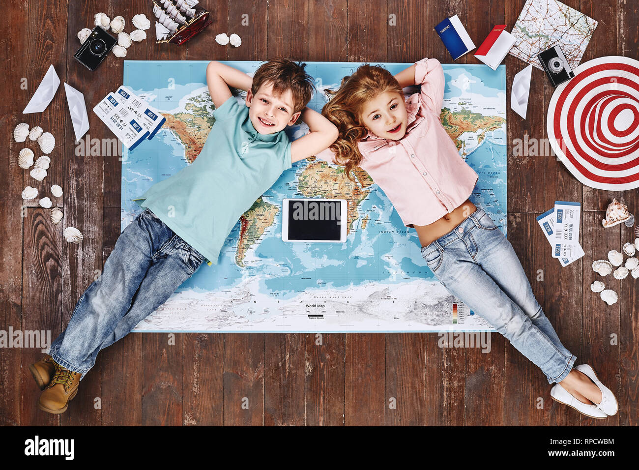 Happy children. Top view creative photo of little boy and girl on ...