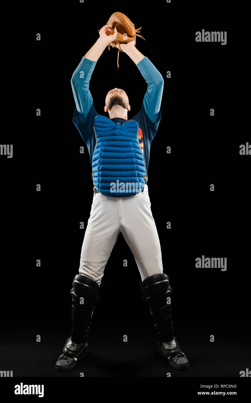 Baseball player catching a ball Stock Photo - Alamy