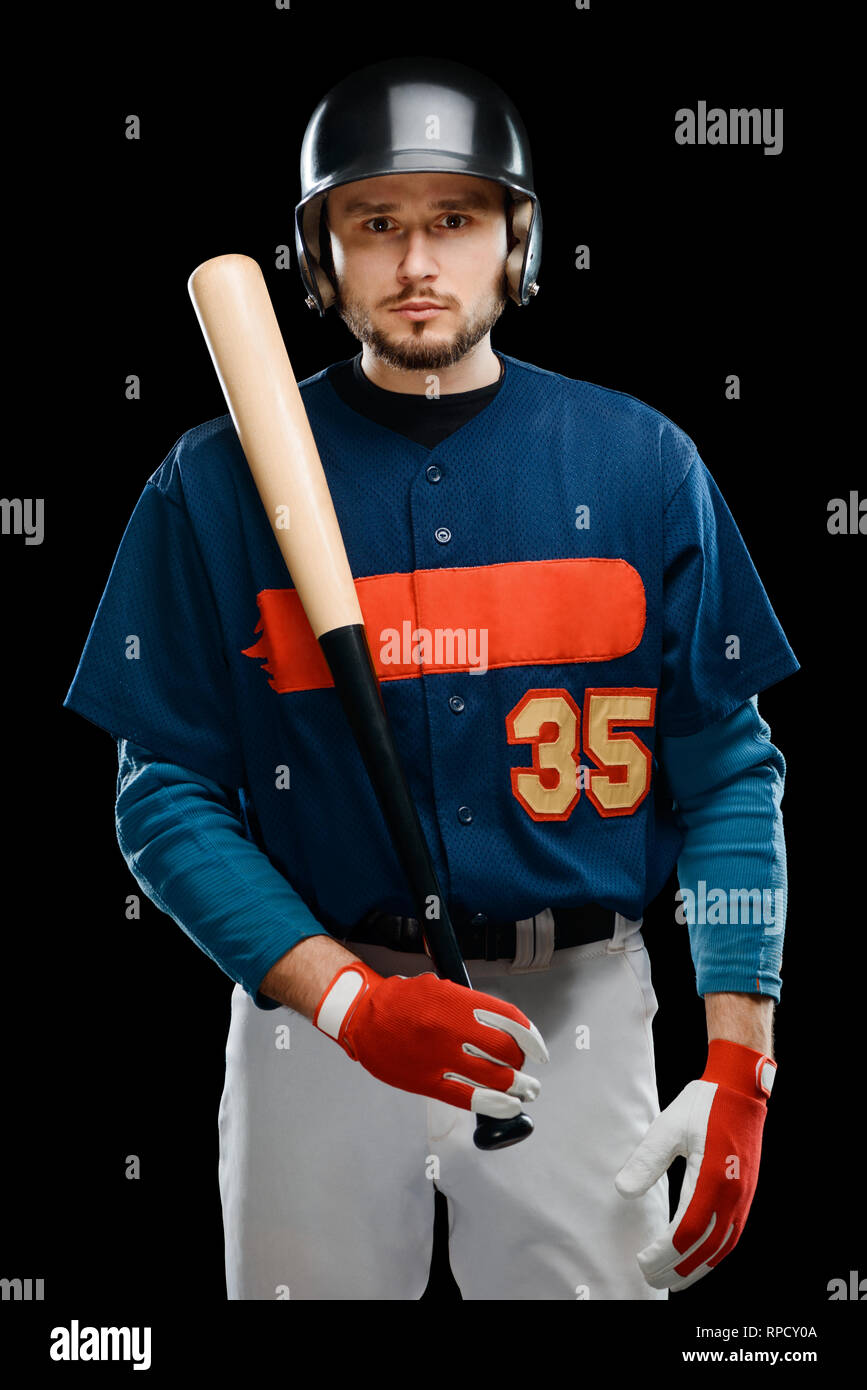 Baseball player posing with bat Stock Photo - Alamy