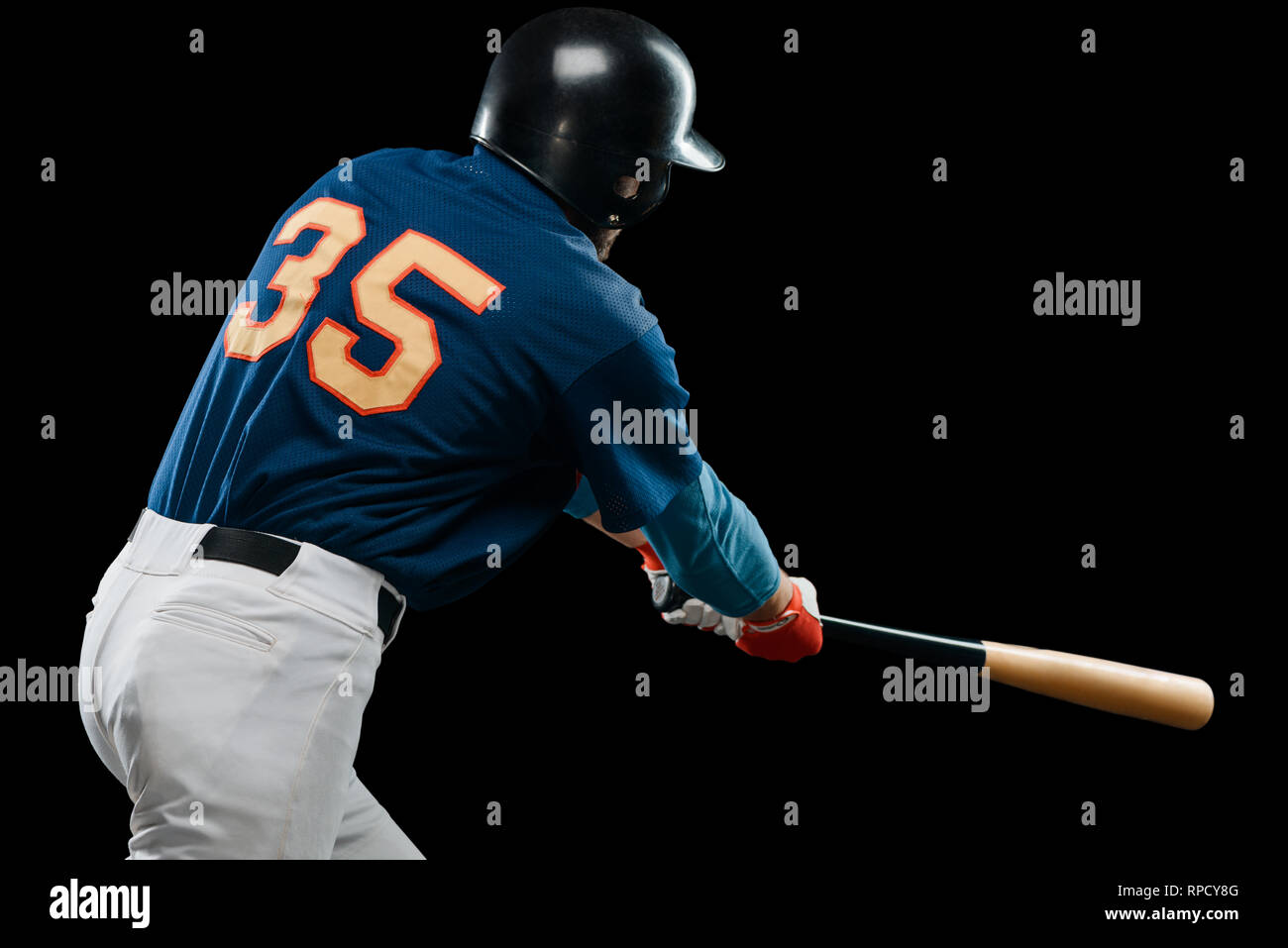 Batter hitting a ball Stock Photo - Alamy
