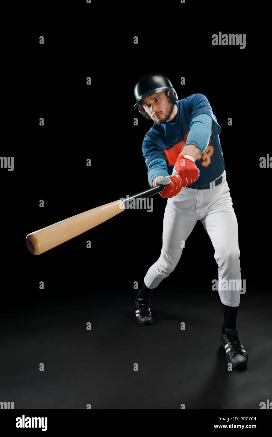 Baseball hitter in action Stock Photo - Alamy