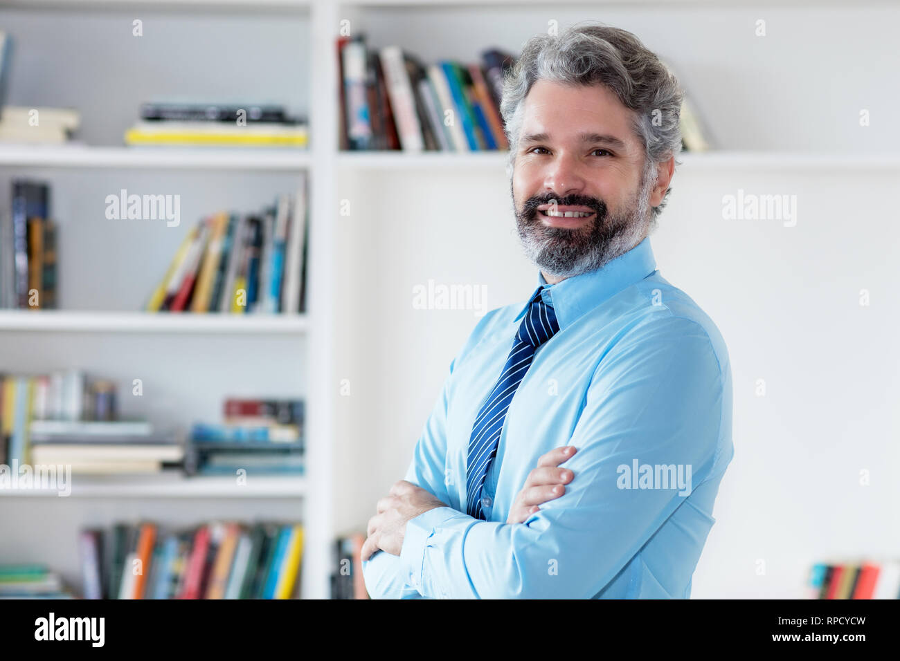 Laughing businessman with grey hair and necktie at office Stock Photo ...