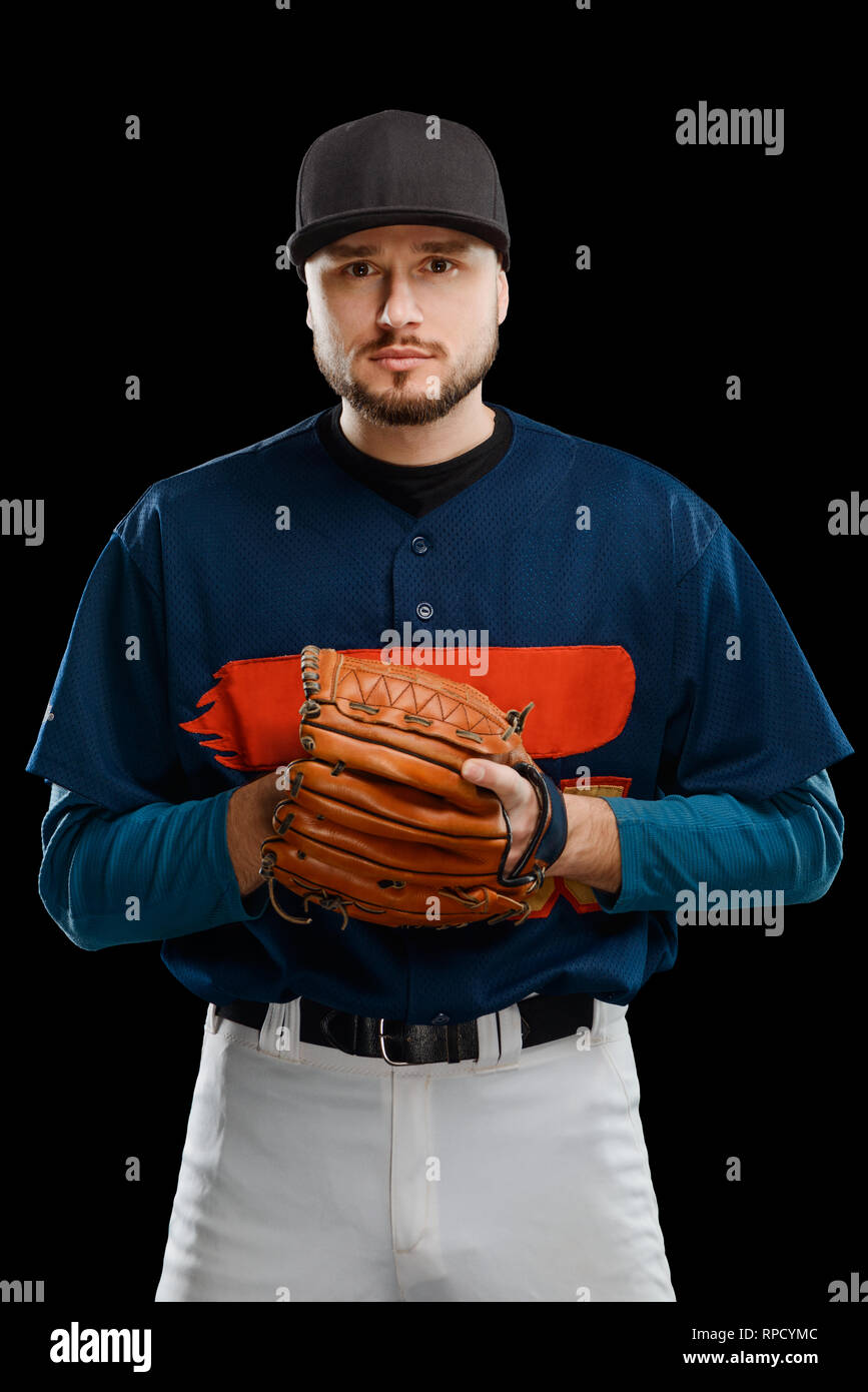 Baseball pitcher on black background Stock Photo - Alamy