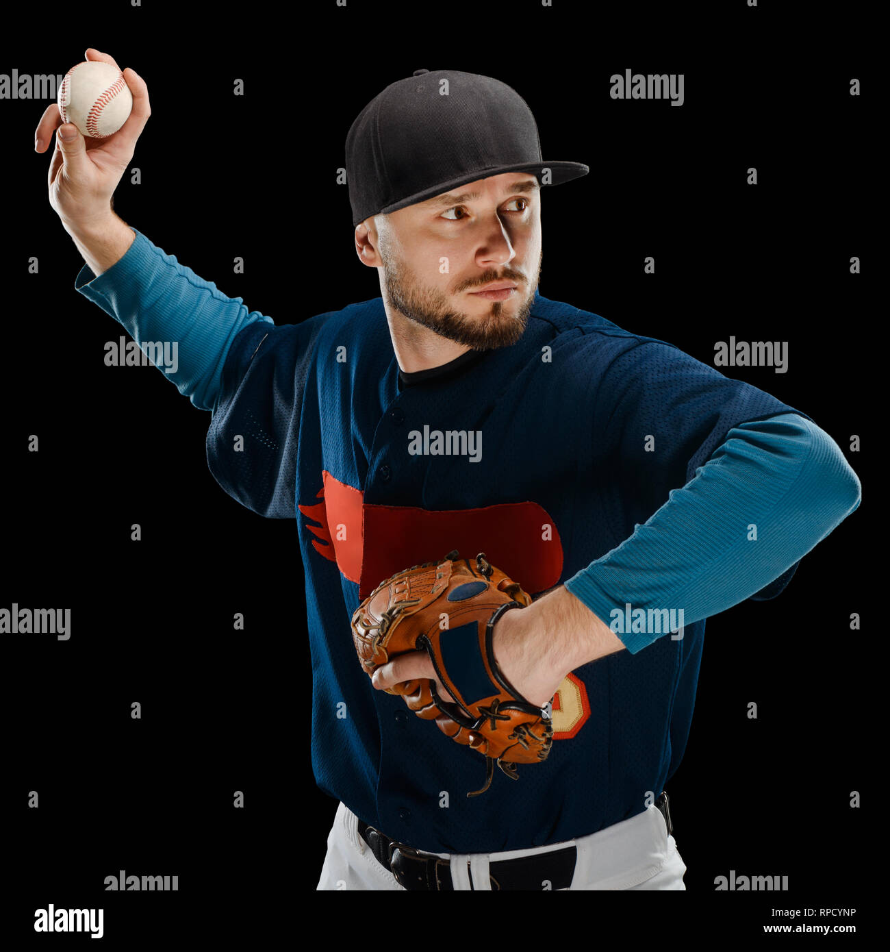 Baseball pitcher making a throw Stock Photo - Alamy