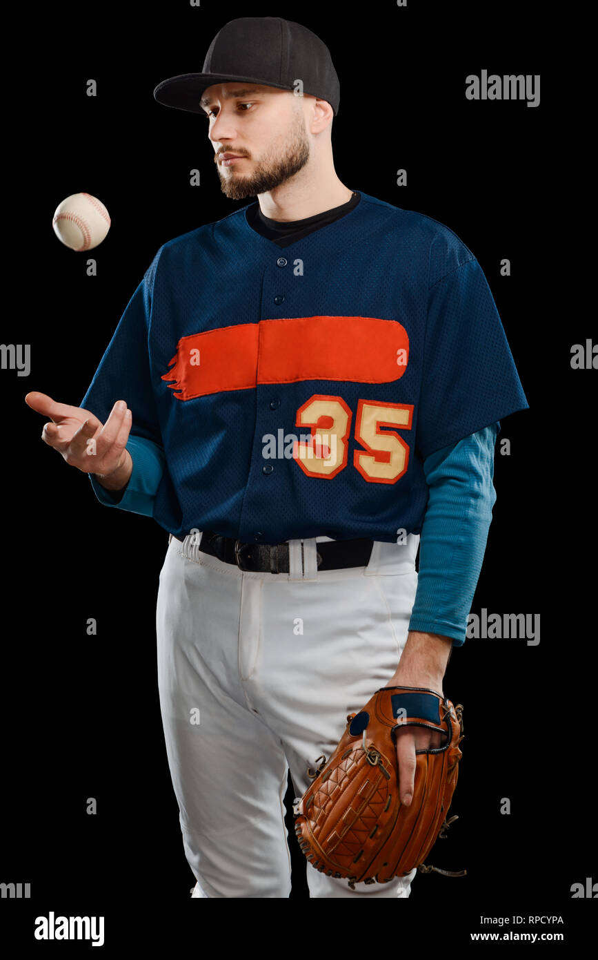 Baseball pitcher throwing ball up Stock Photo - Alamy