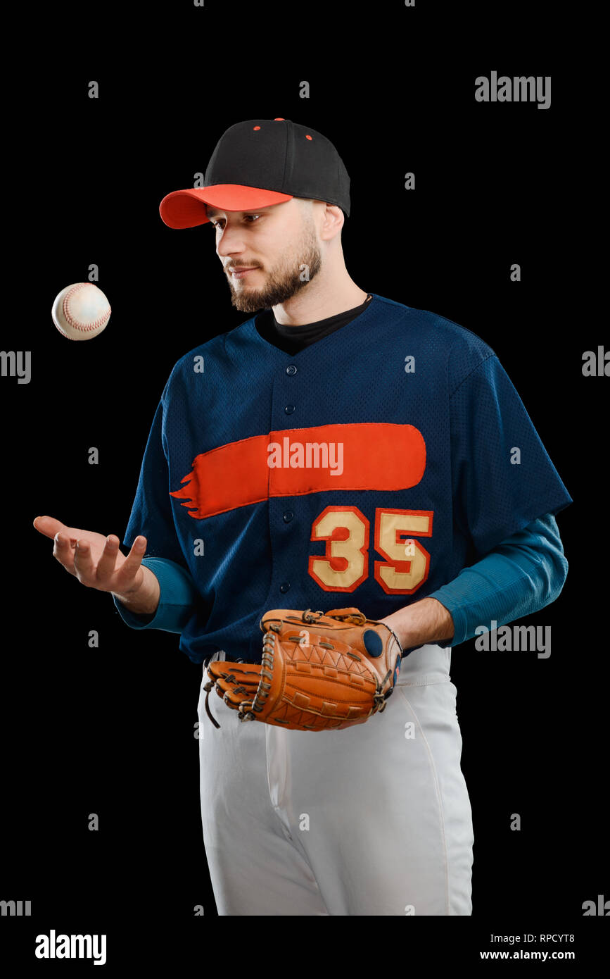 Pitcher playing with a ball Stock Photo - Alamy