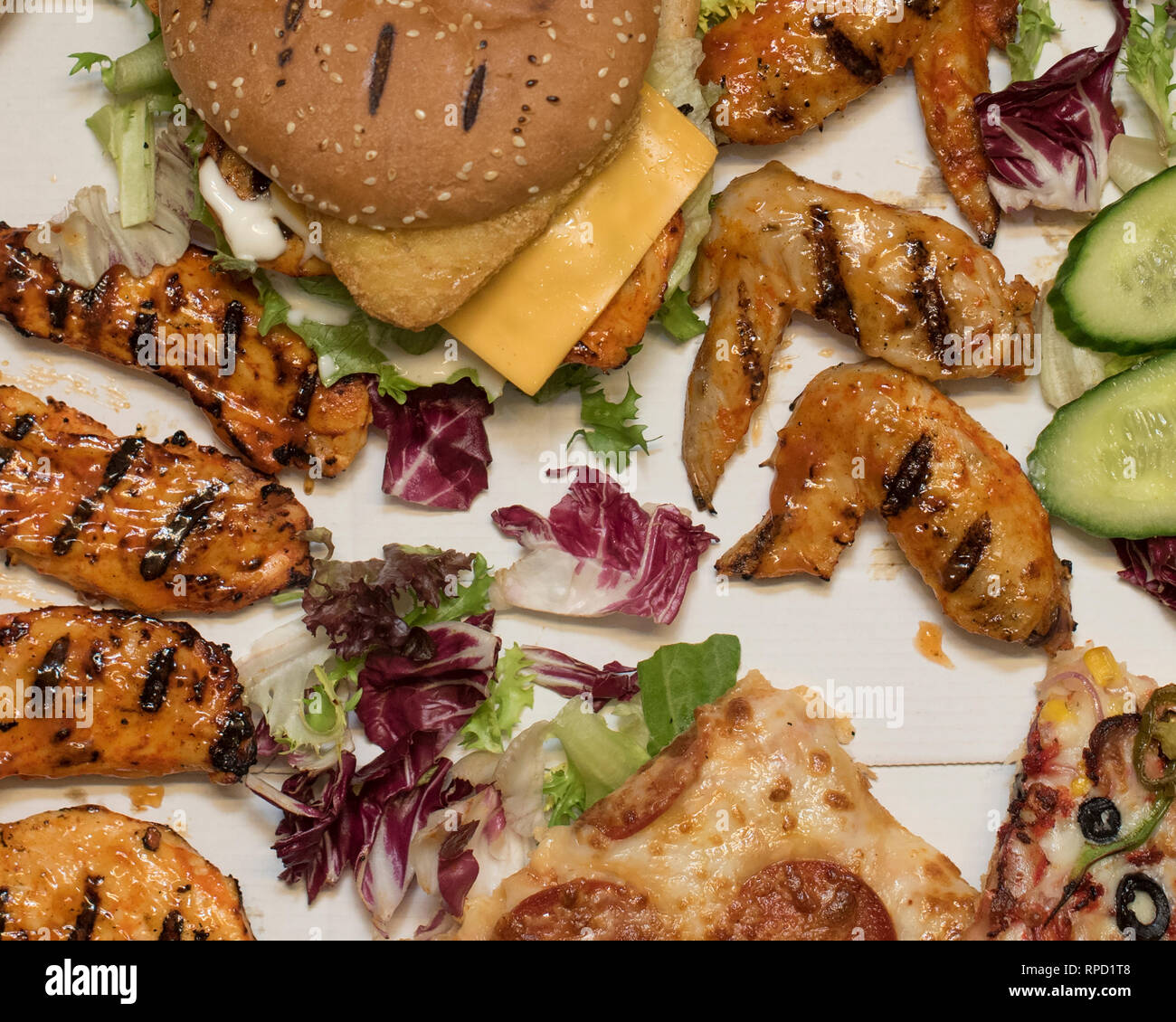 A top down display of tasty chicken and burgers fast food Stock Photo ...