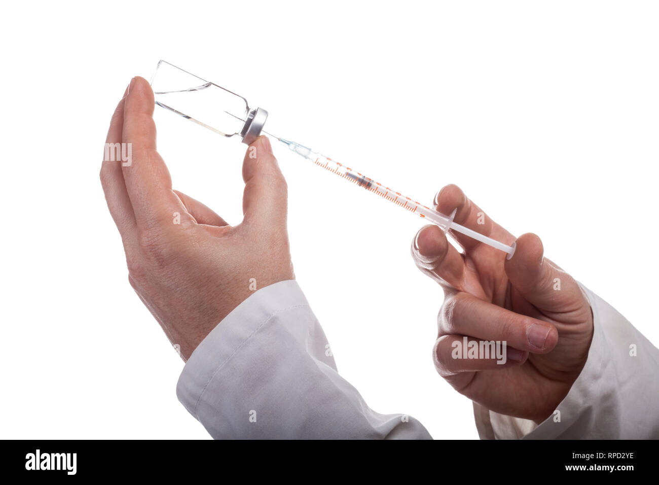 A syringe and a bottle with an injection solution on white background ...