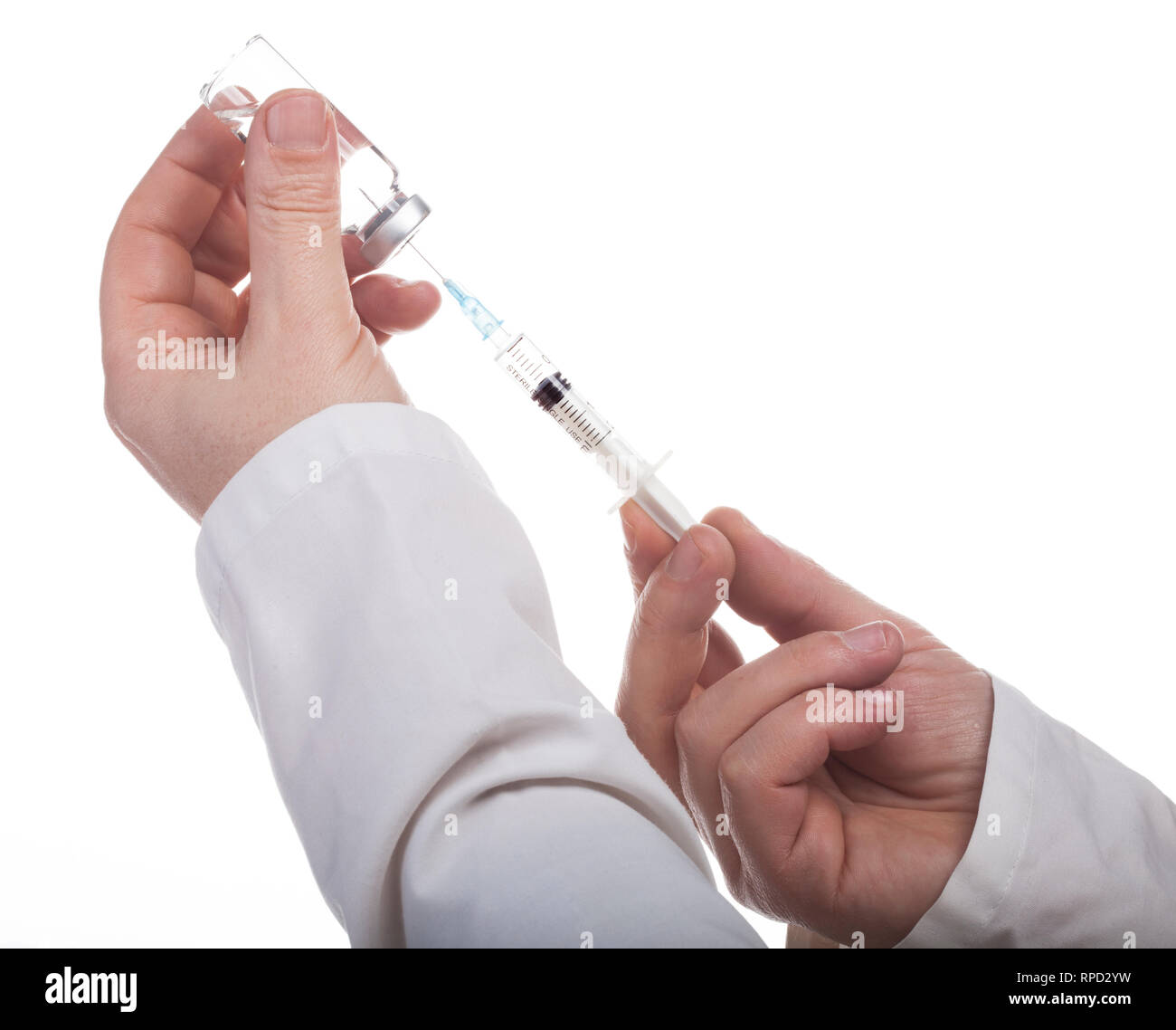 A syringe and a bottle with an injection solution on white background ...