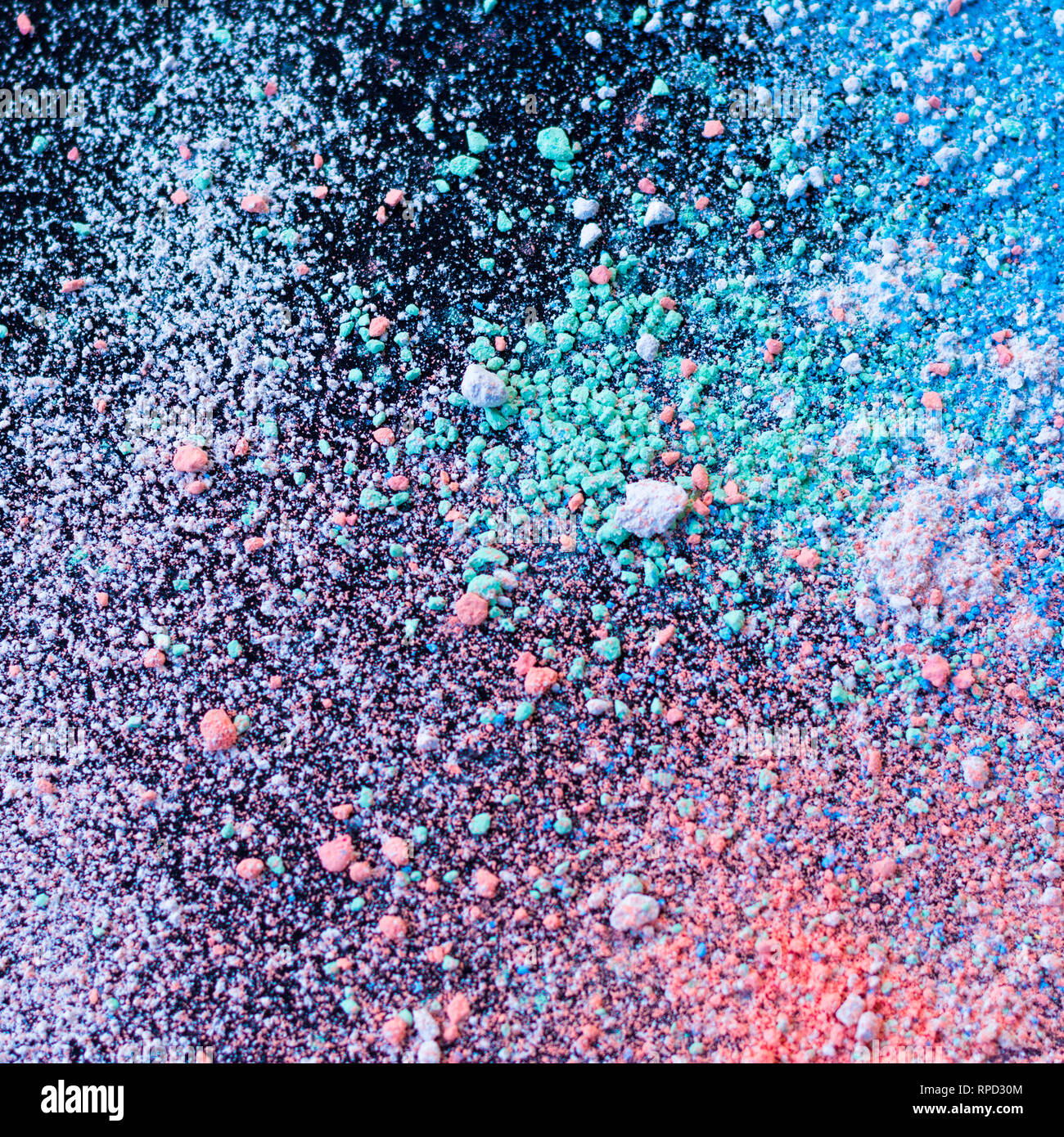 Colorful background of chalk powder. Multicolored dust particles ...