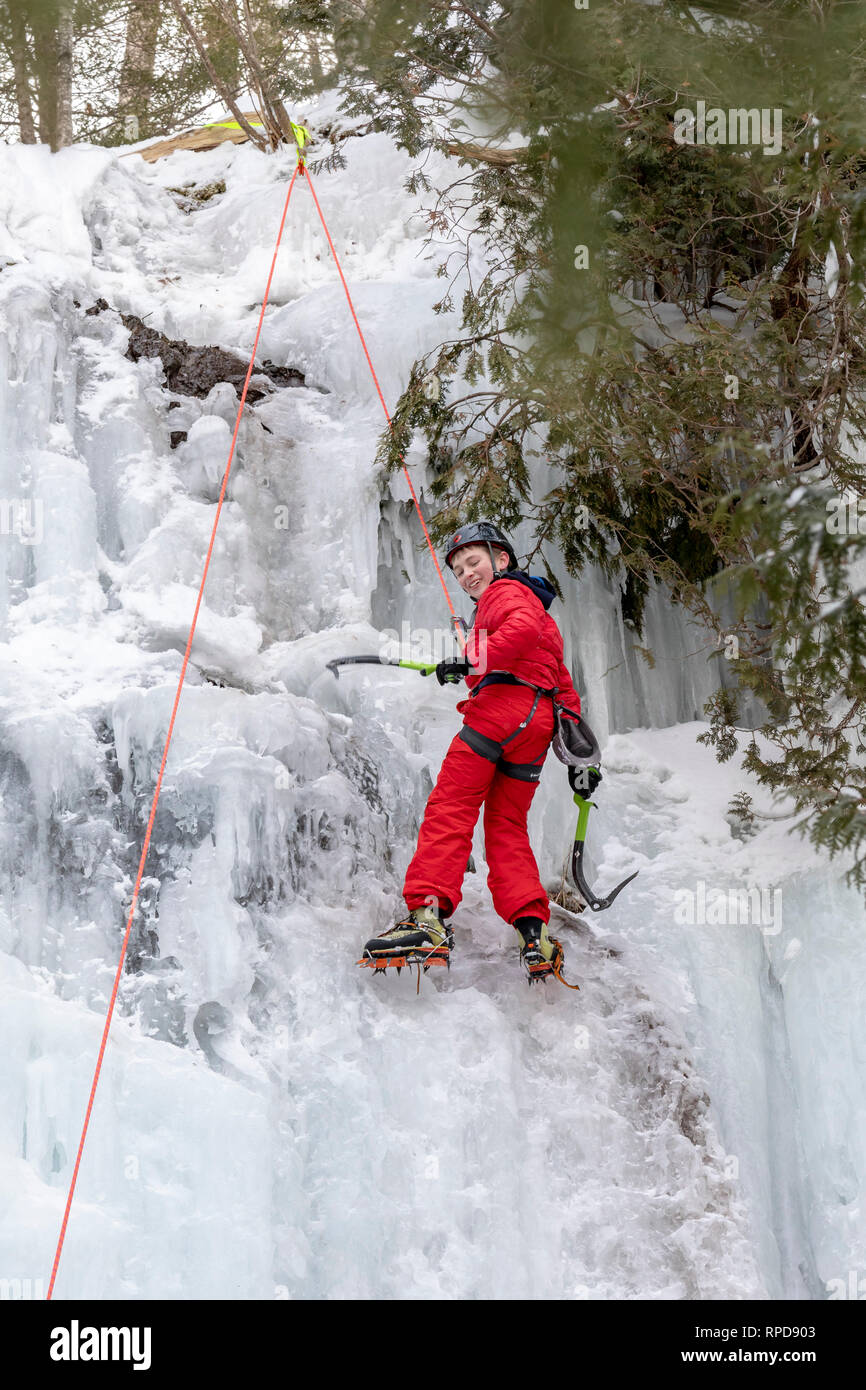 Munising, Michigan - A boy climbs an ice wall during the annual ...