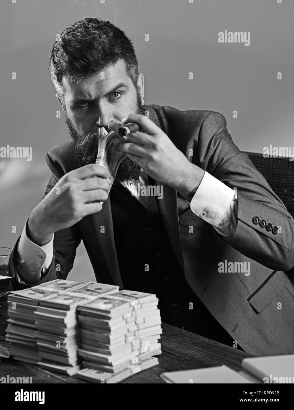 Money and power. Business and finance. Bearded man count dollars while ...