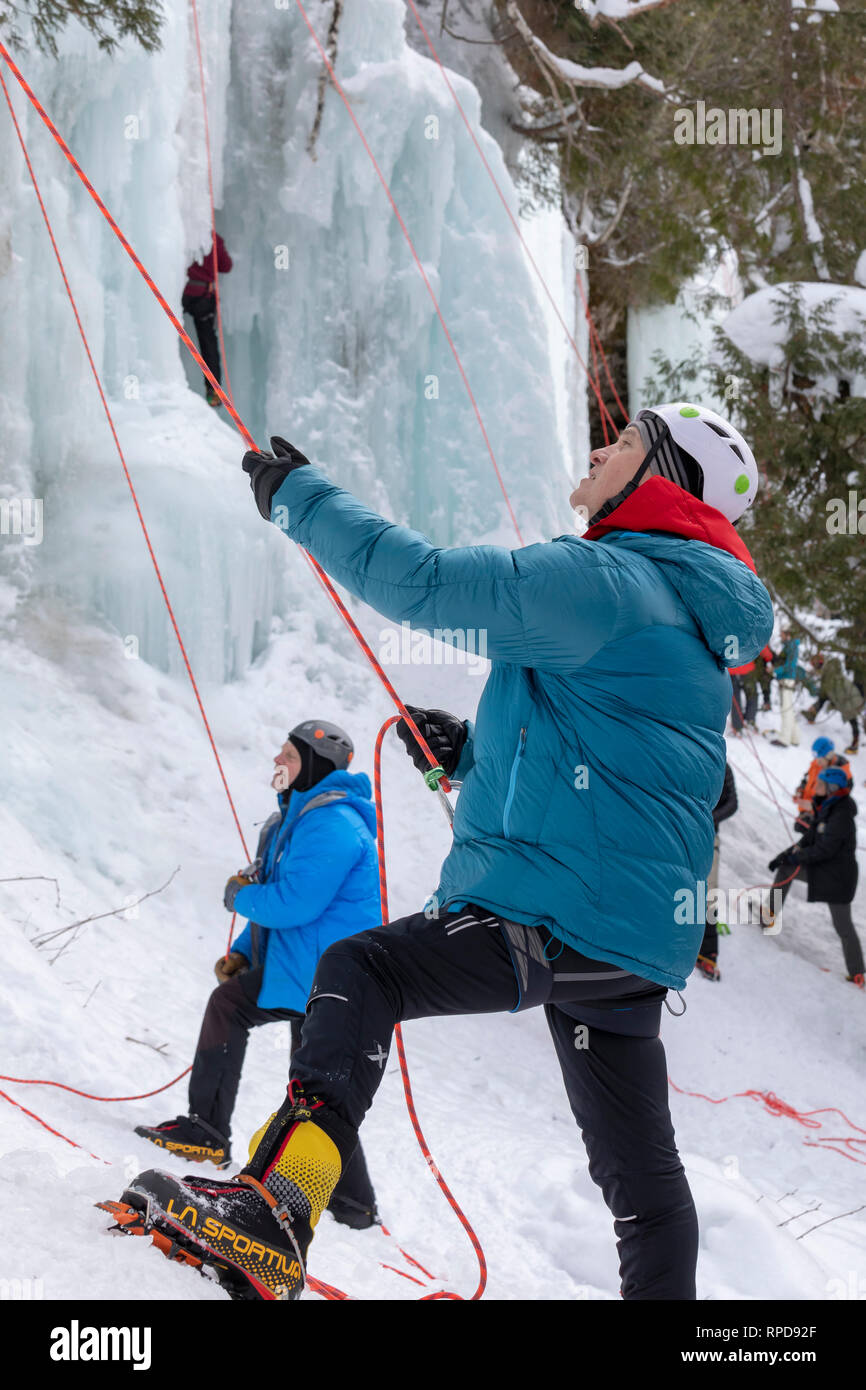Munising, Michigan - Men belay climbers in the annual Michigan Ice Fest ...