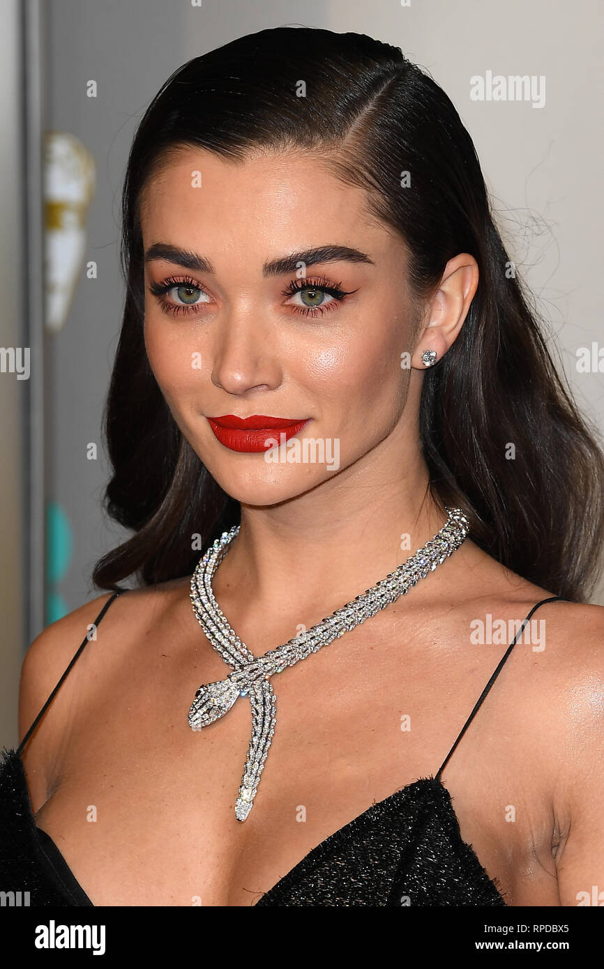 British actress Amy Jackson attends the EE British Academy Film Awards ...