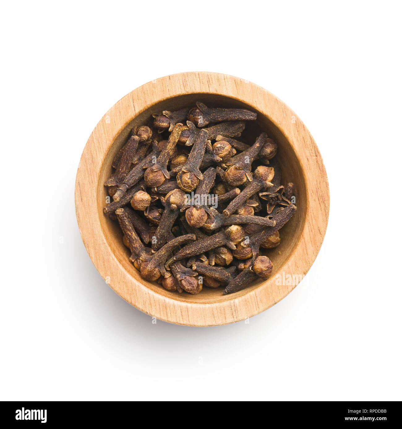Carnation, dried clove spice in wooden bowl isolated on white ...