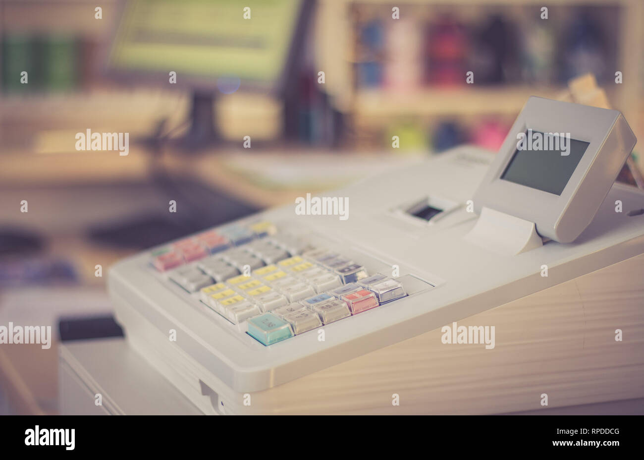 Cash register in a shop: Customer is paying purchase Stock Photo - Alamy