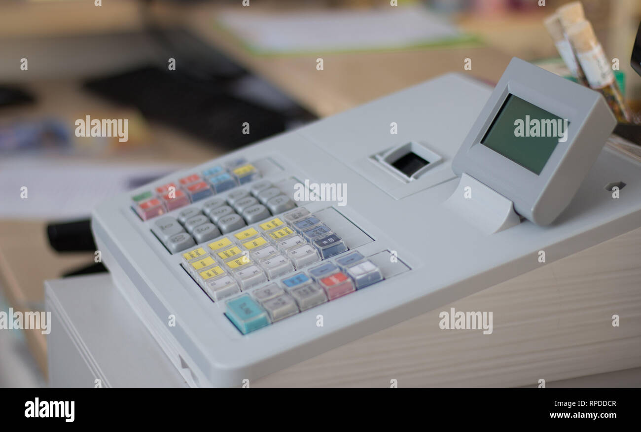 Cash register in a shop: Customer is paying purchase Stock Photo - Alamy