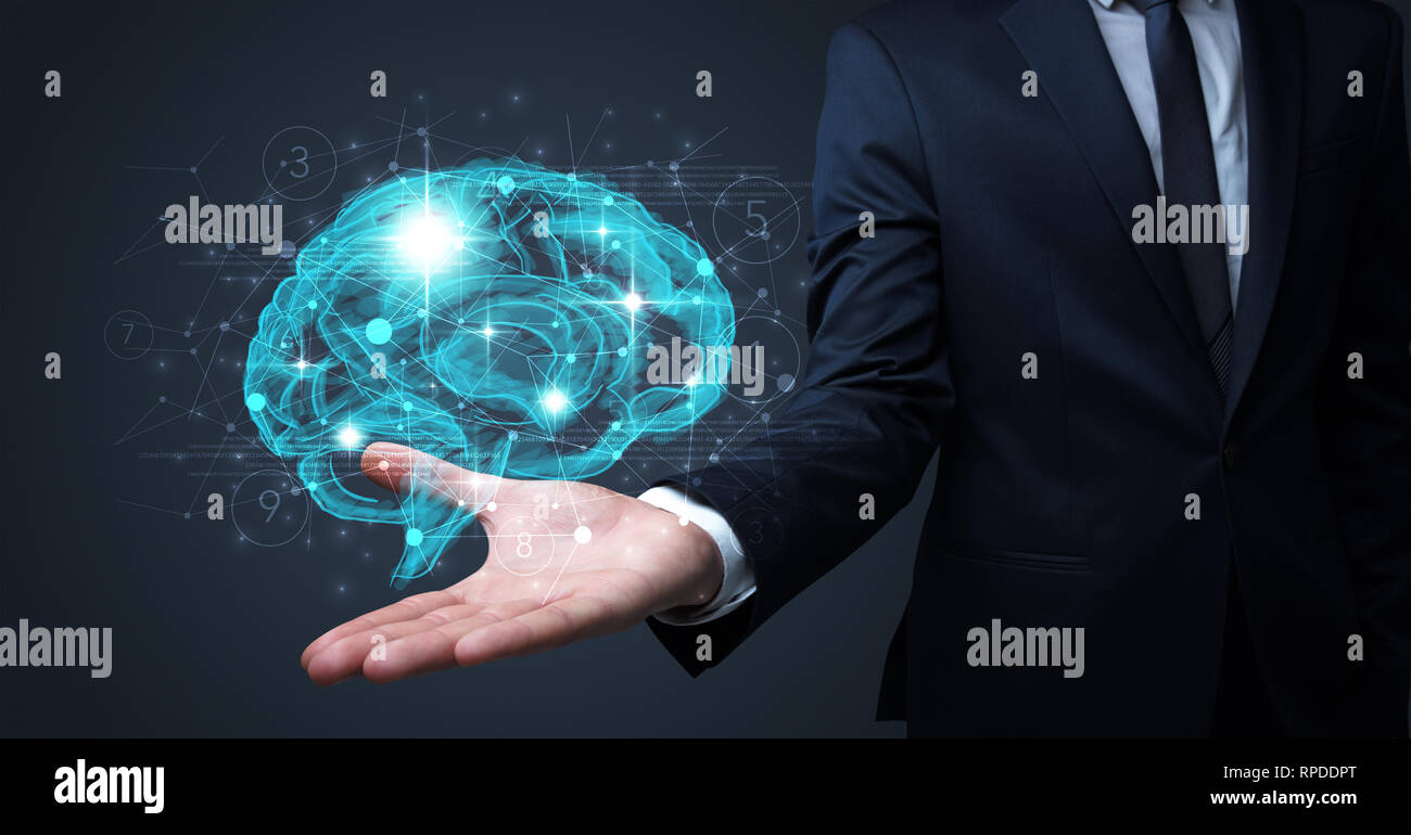 Businessman holding human brain on his hand with logistics symbols ...