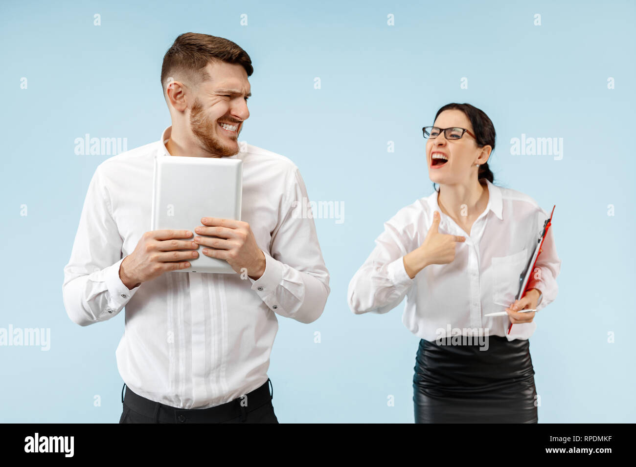 Angry boss. Woman and his secretary standing at office or studio ...