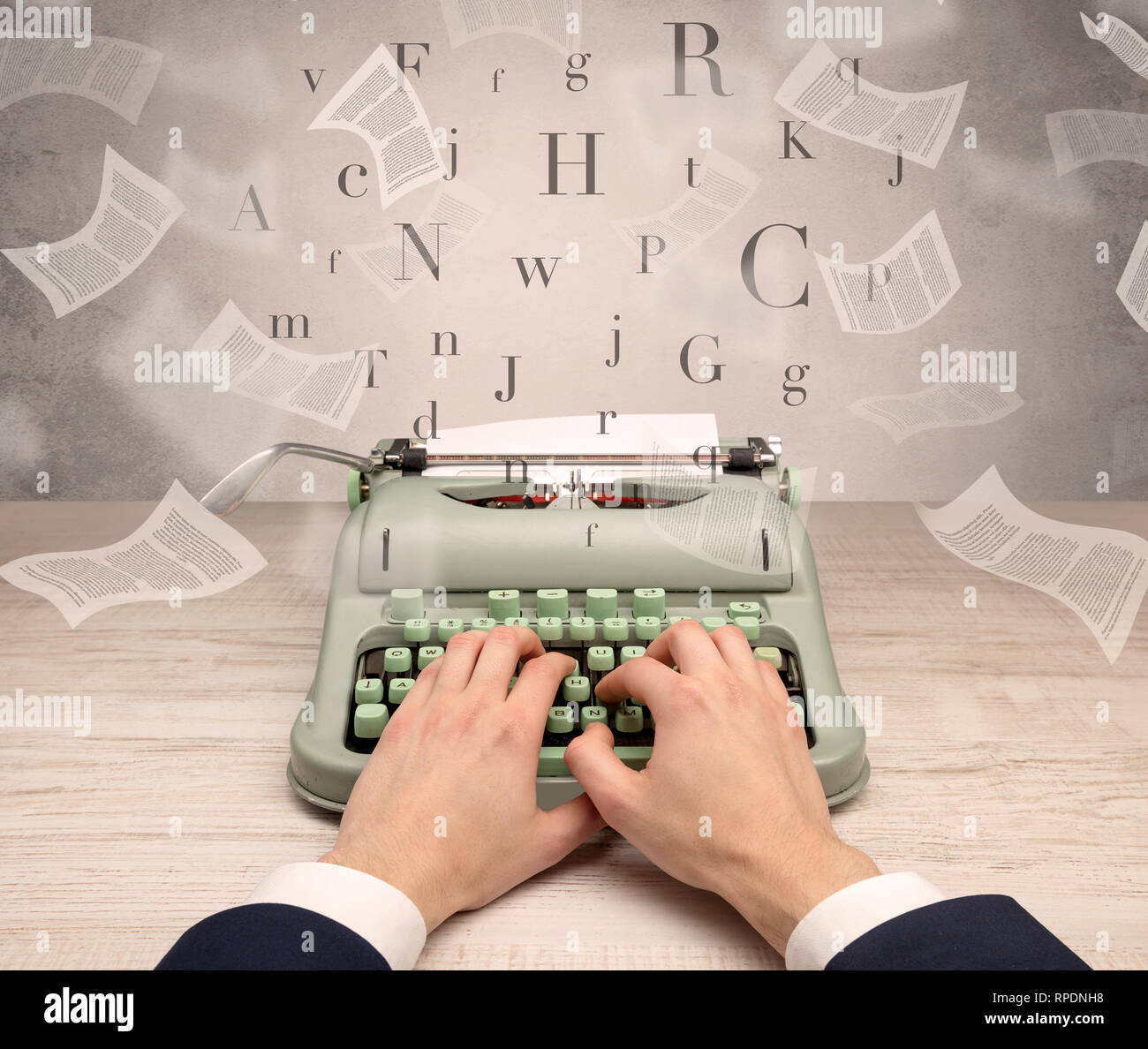 First person perspective hand typewriting with flying documents around ...