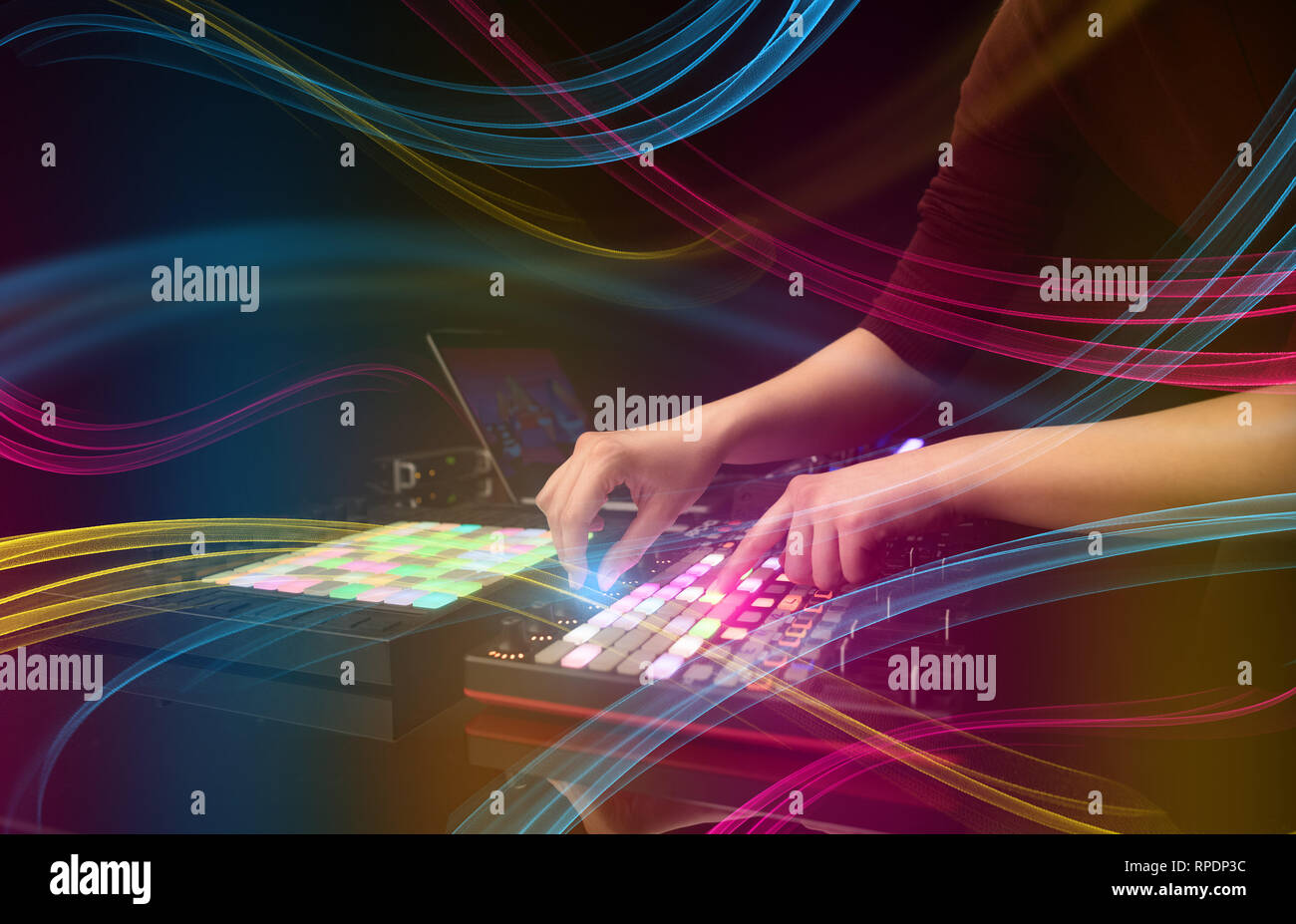 Hand mixing music on midi controller with colorful vibe concept Stock ...