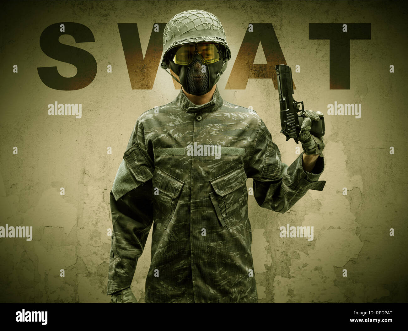 Uniformed armed soldier with damaged wall background Stock Photo - Alamy