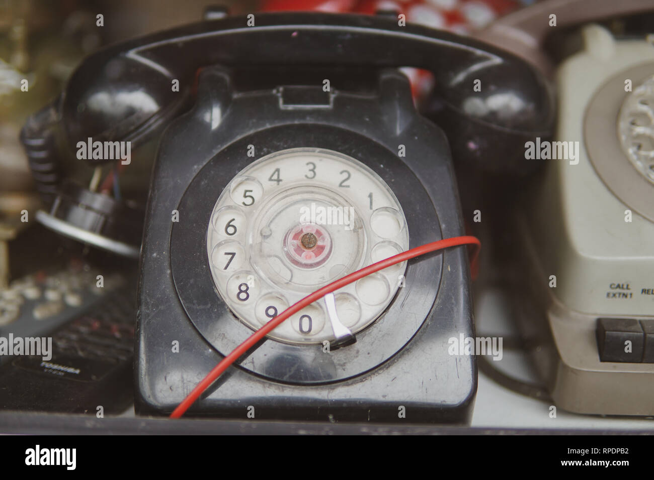 Old and obsolete mobile phone or cell phones on space of old wood ...