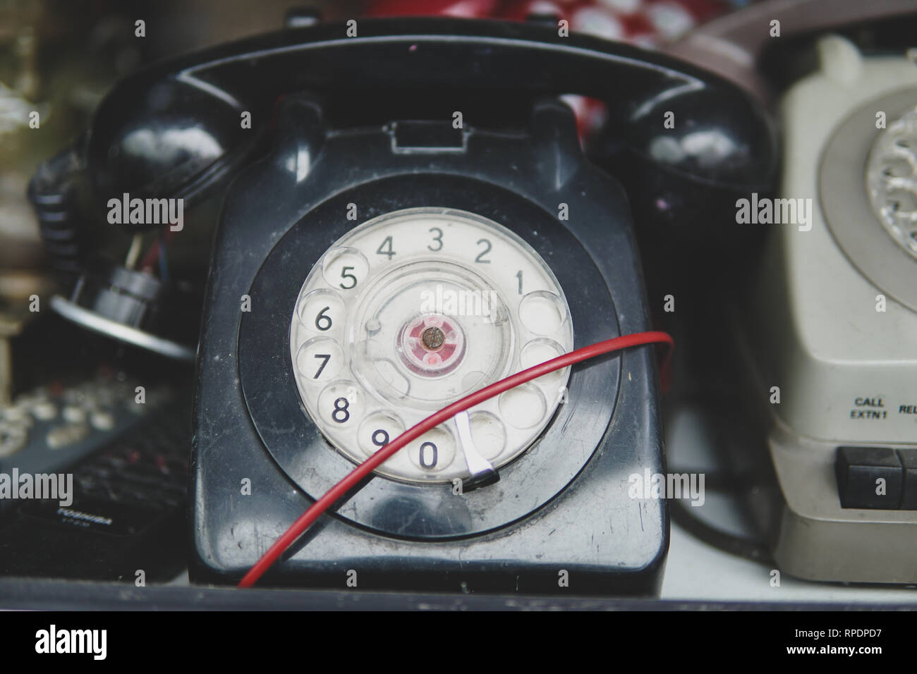 Old and obsolete mobile phone or cell phones on space of old wood ...